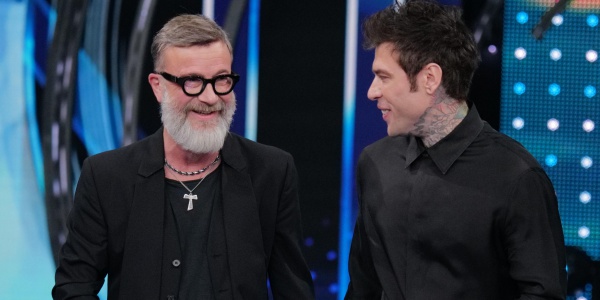 Fedez e Marco Masini a Sanremo 2026: testo e significato di "Male ...